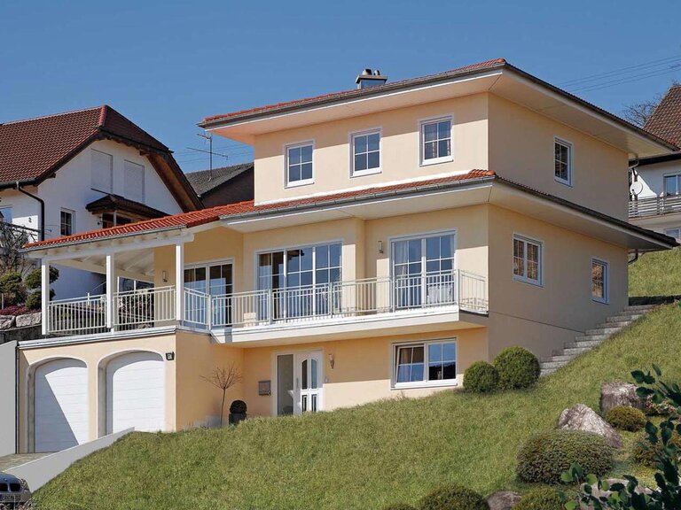 Elegantes Walmdachhaus mit Anbau | LUXHAUS Walmdach 169 | LUXHAUS